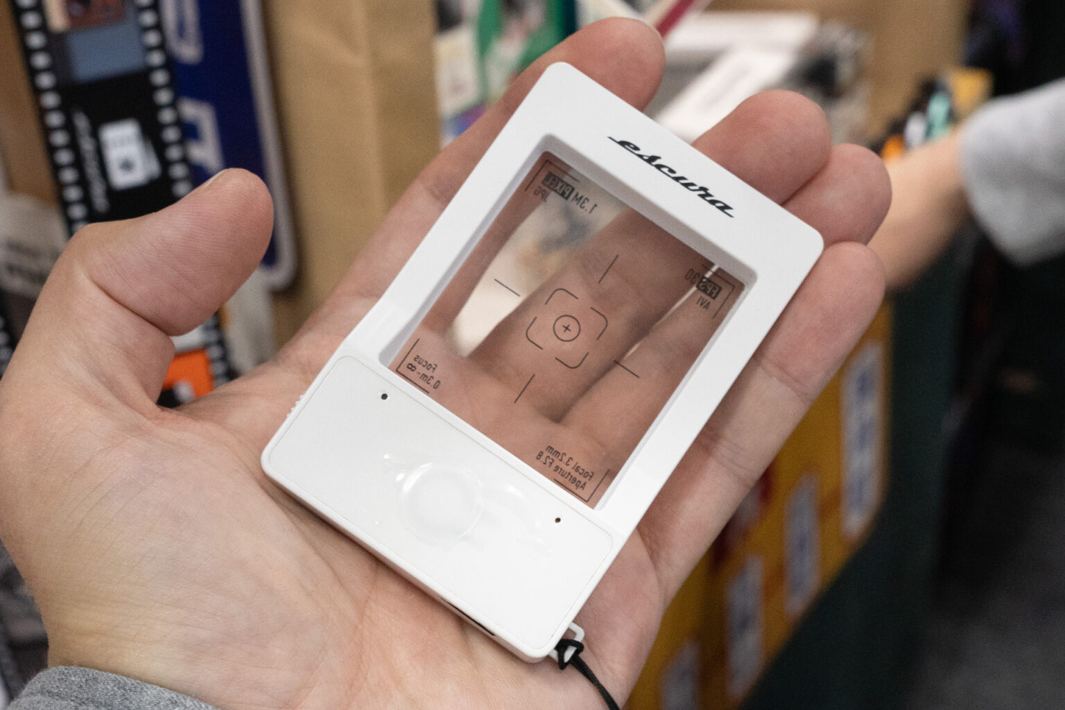 This InstantSnap camera by Escura just has a large optical viewfinder ...